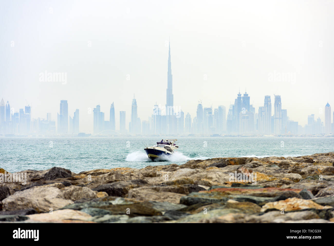 (Selective focus) A small boat with tourists on board is sailing in ...
