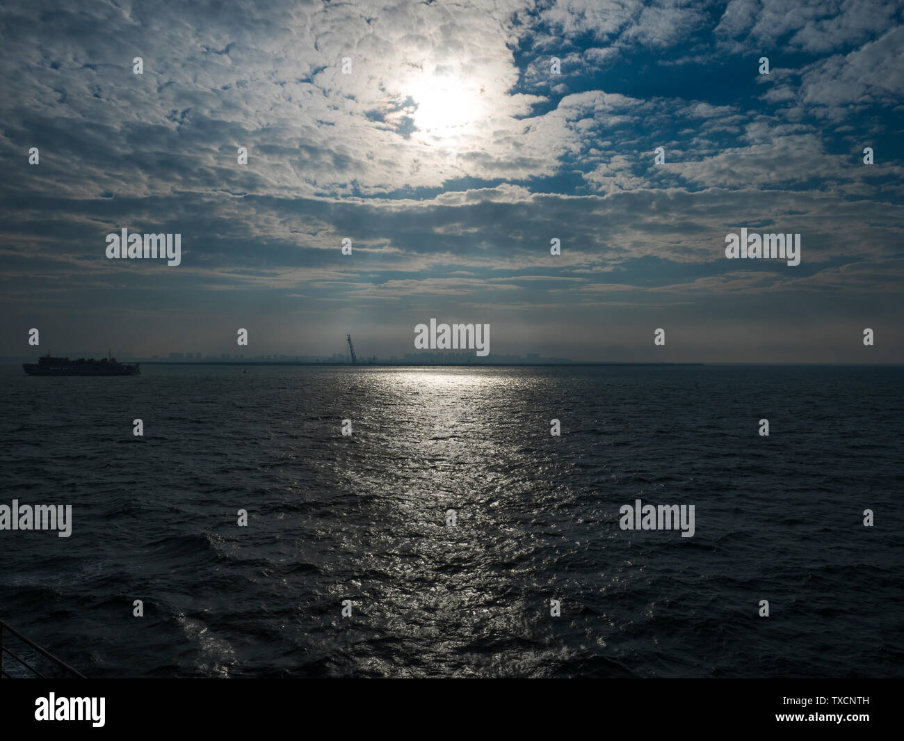 Sunset sea level Stock Photo - Alamy