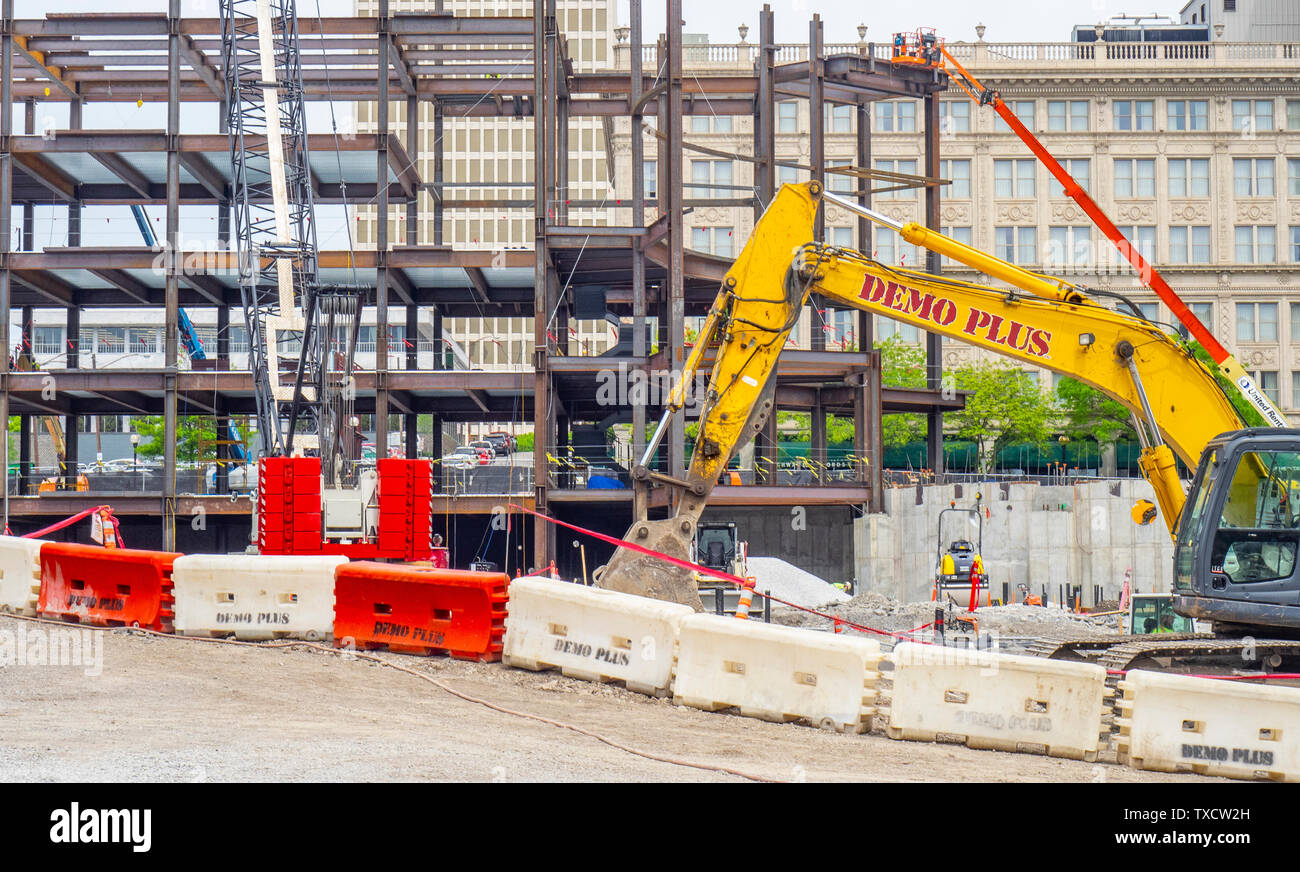 Excavator and cherry picker at a construction site Nashville Tennessee ...