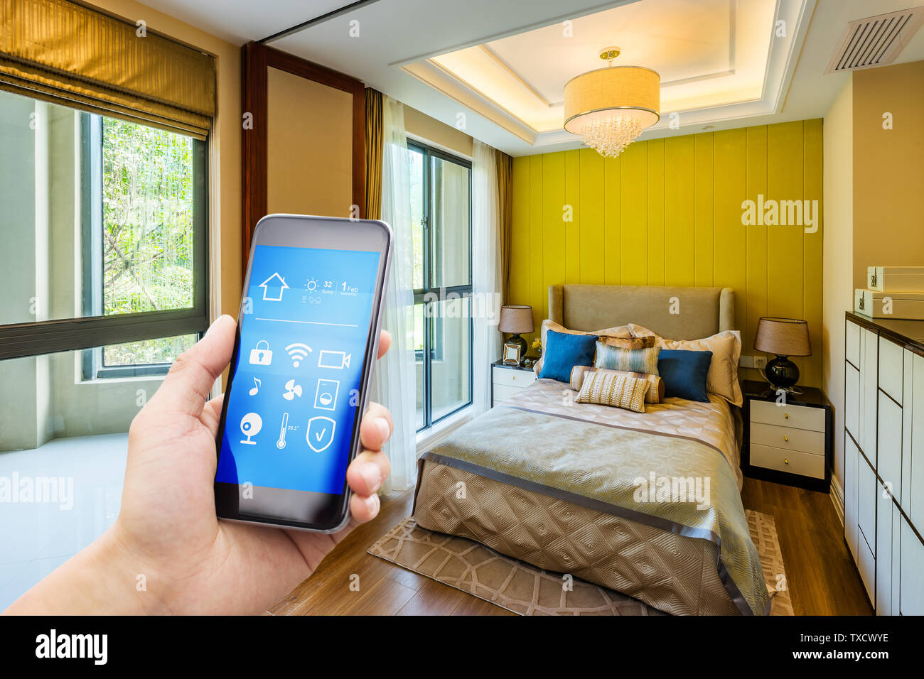 Smart phone with smart home with modern Stock Photo - Alamy