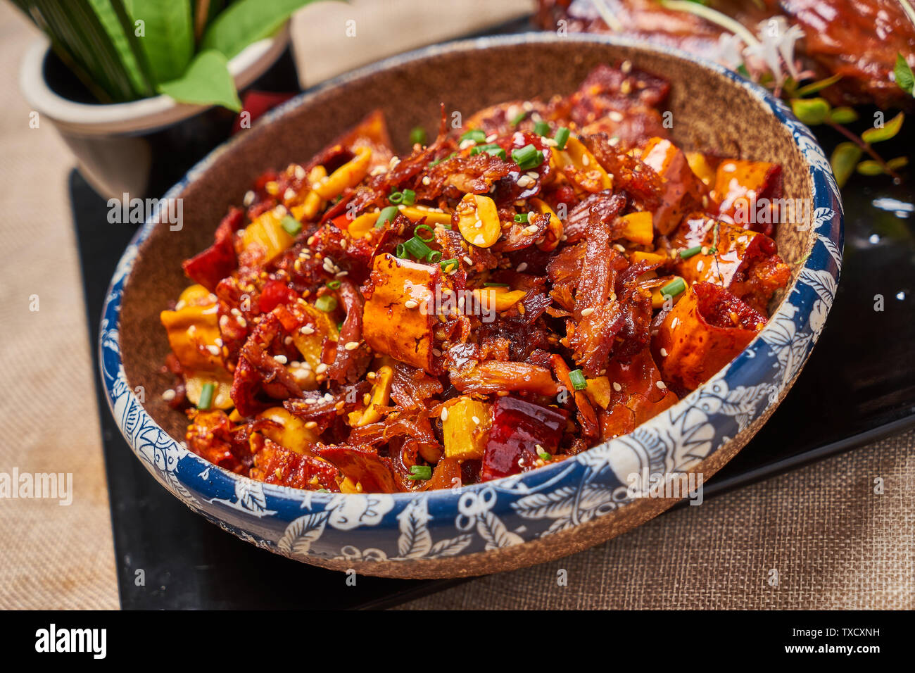 Sichuan-flavored hand-torn rabbit Stock Photo - Alamy