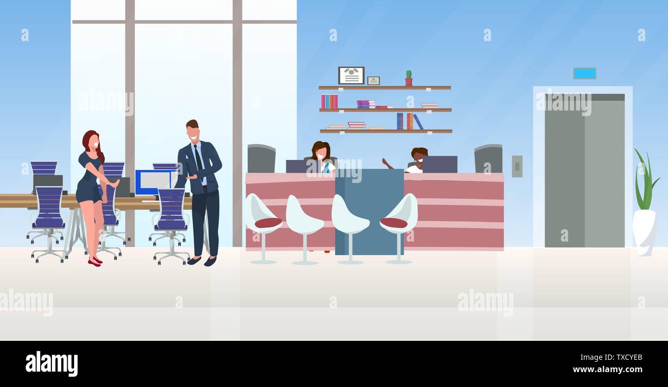 businesspeople couple discussing during meeting at reception counter ...