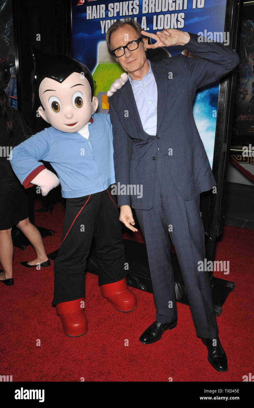 LOS ANGELES, CA. October 19, 2009: Bill Nighy with Astro Boy character ...