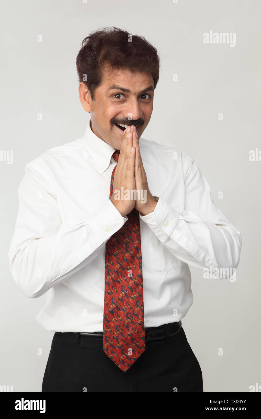 Portrait of a businessman laughing Stock Photo - Alamy