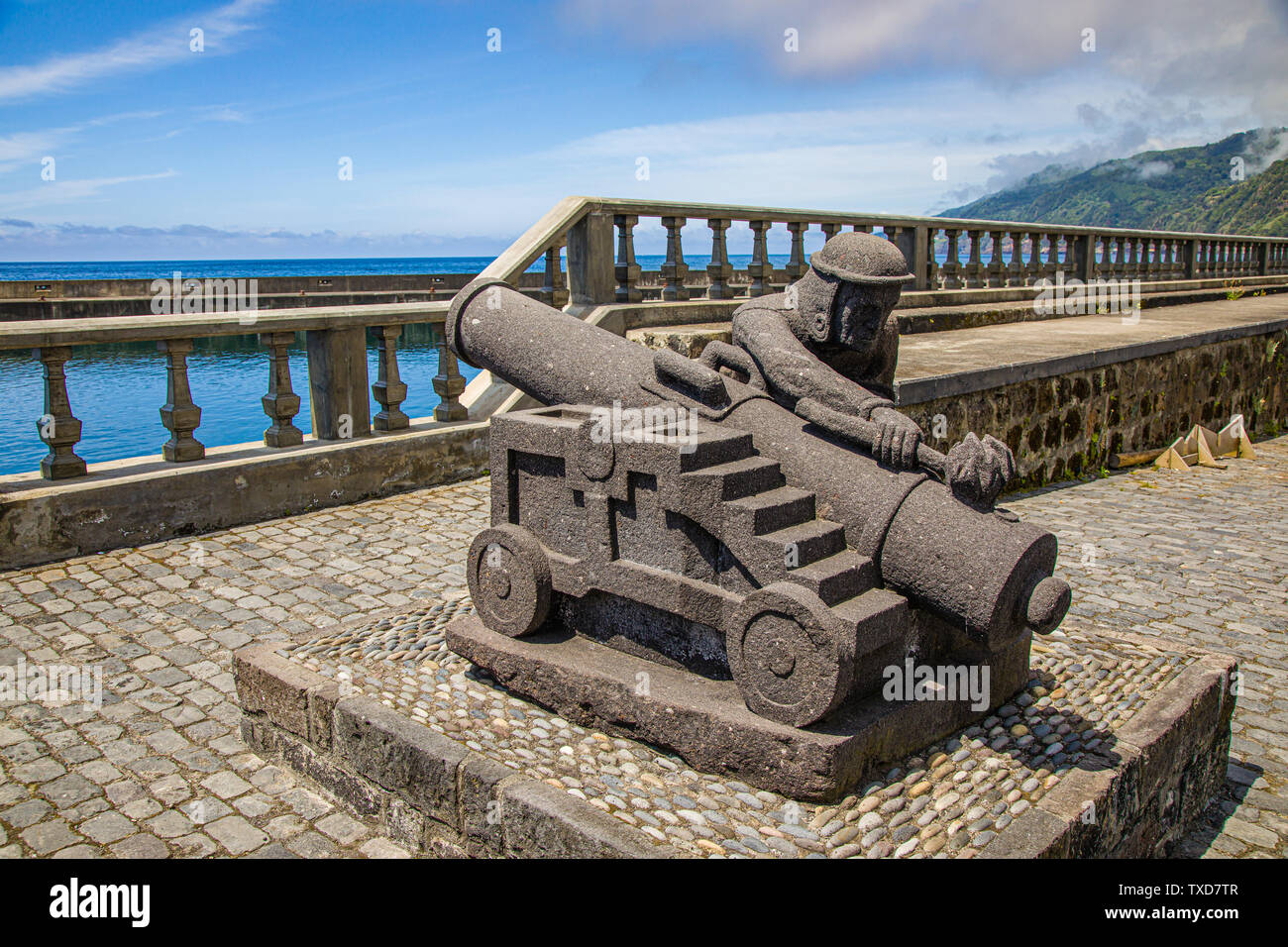 Monument on the waterfront in the harbor Povoacao, Sao Miguel, Azores ...