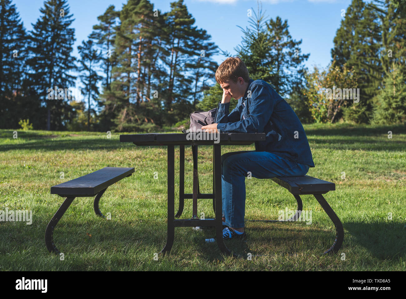 Lonely man sitting table hi-res stock photography and images - Alamy