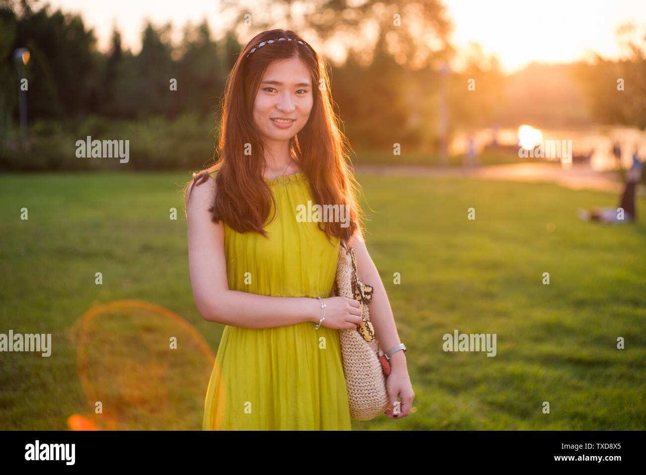 Backlight yellow girl Stock Photo - Alamy