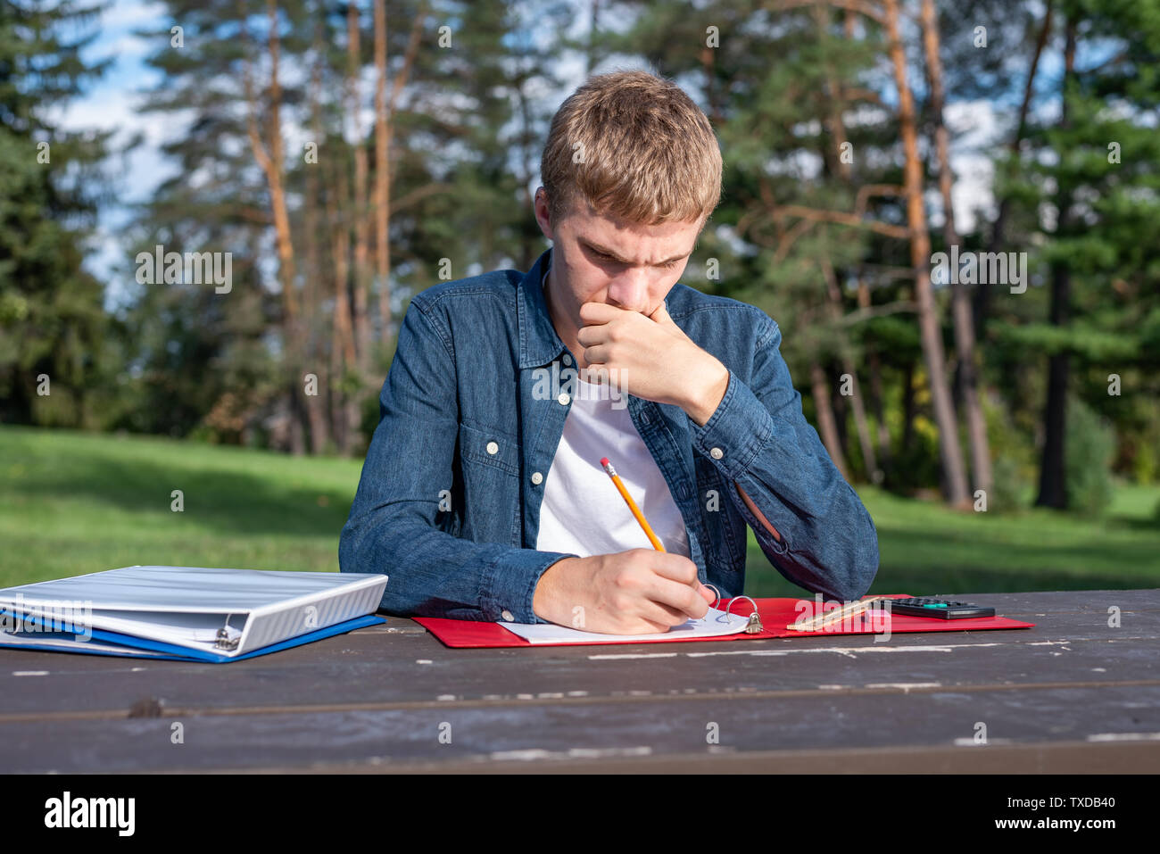 Frustrated teen boy working hi-res stock photography and images - Alamy