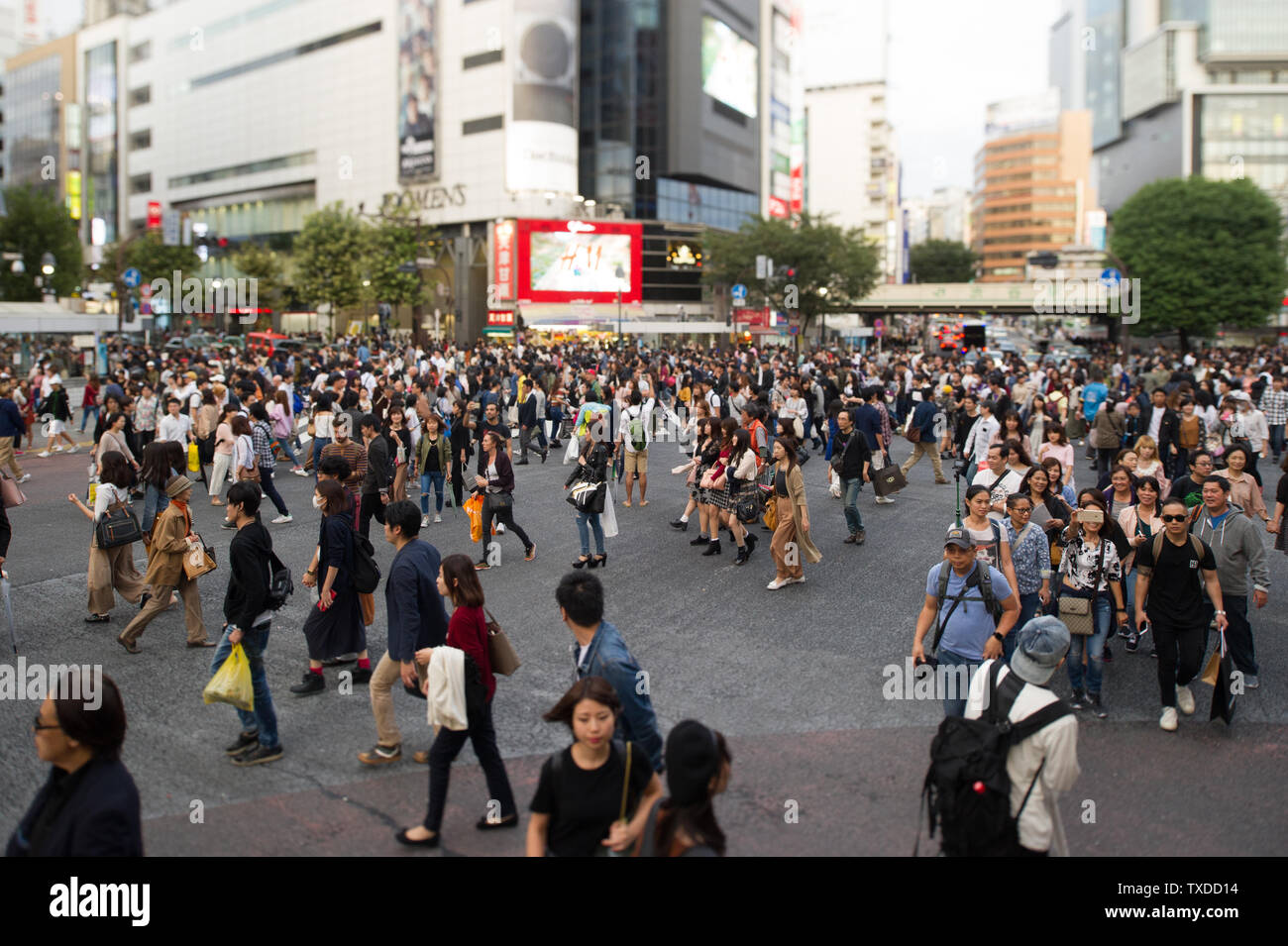 Shibuya Crossing in Tokyo, Japan, is famous for it's extremely busy scramble crosswalk, with ...