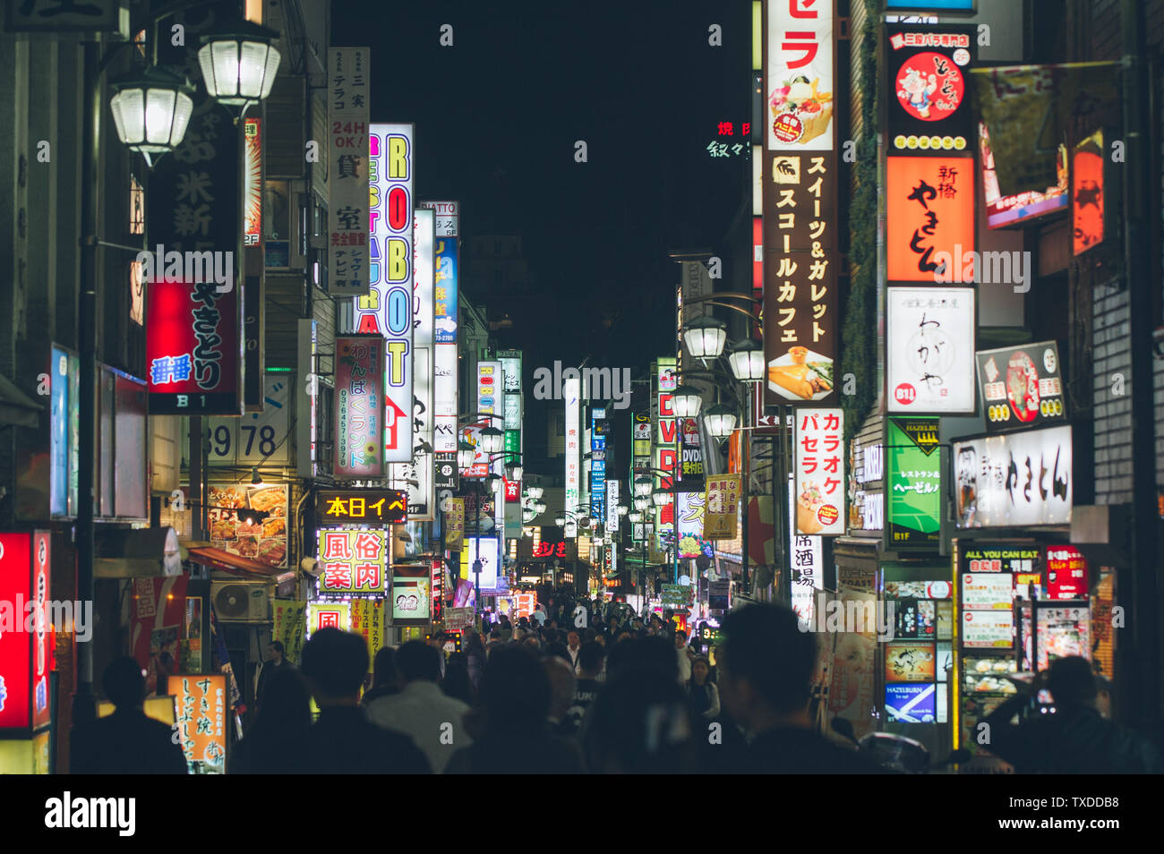 Tokyo at night, lit by its many famous neon signs Stock Photo - Alamy