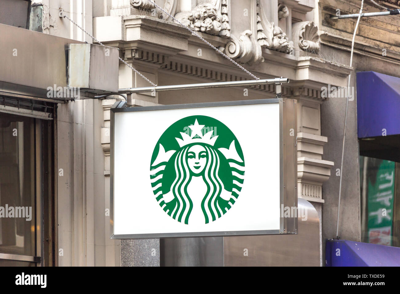 NEW YORK, USA - 16 MAY, 2019: Starbucks sign in a Starbucks restaurant ...