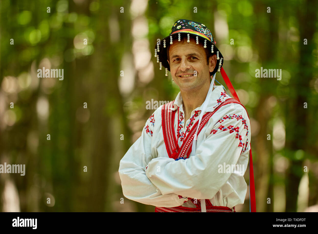 Portrait of a Romanian man in traditional costume outdoor Stock Photo ...