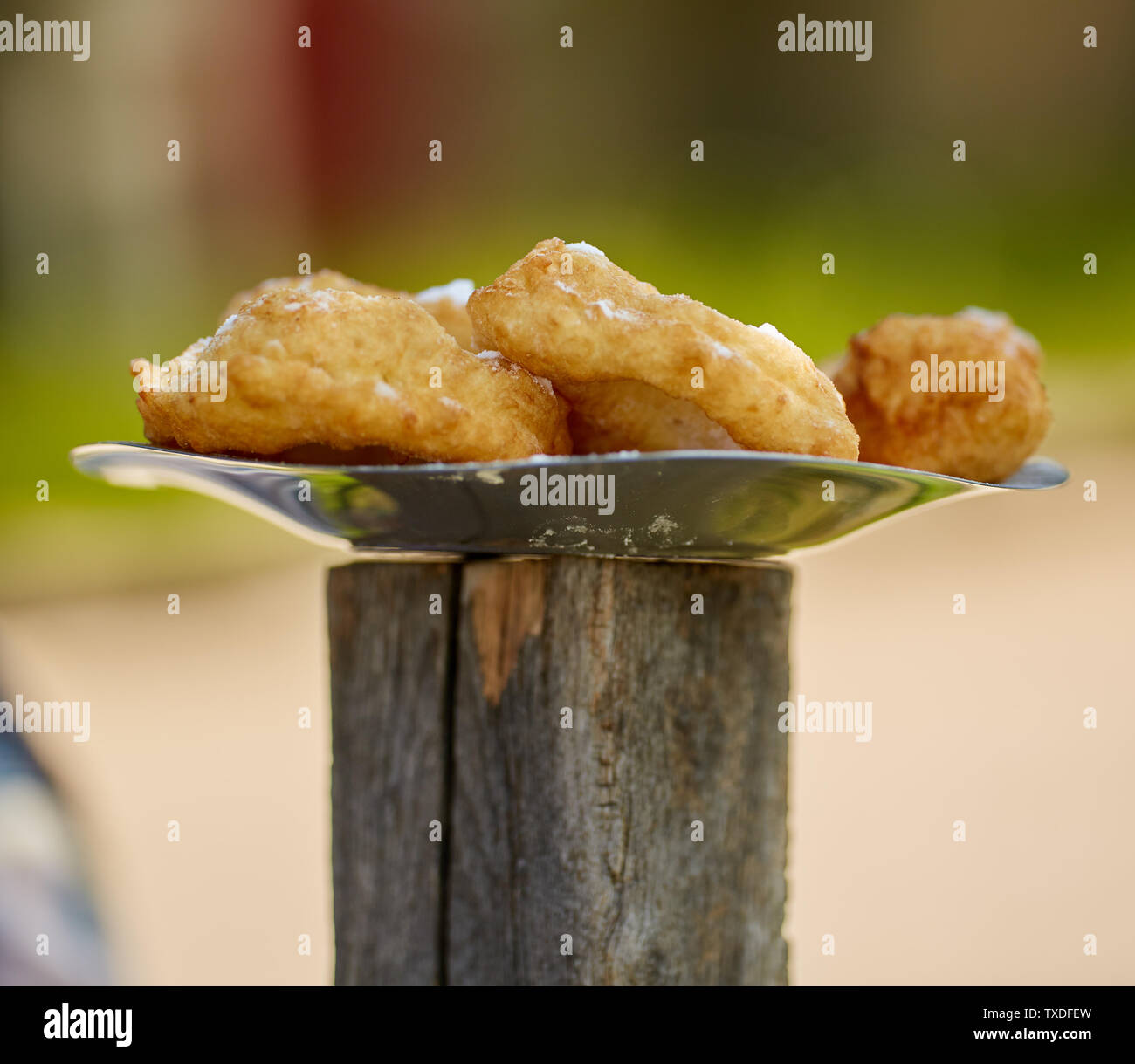 Romanian traditional fair donuts on a plate outdoor Stock Photo - Alamy