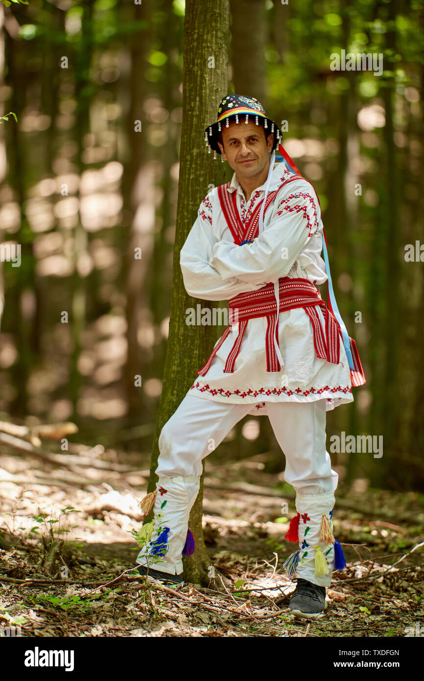 Portrait of a Romanian man in traditional costume outdoor Stock Photo ...