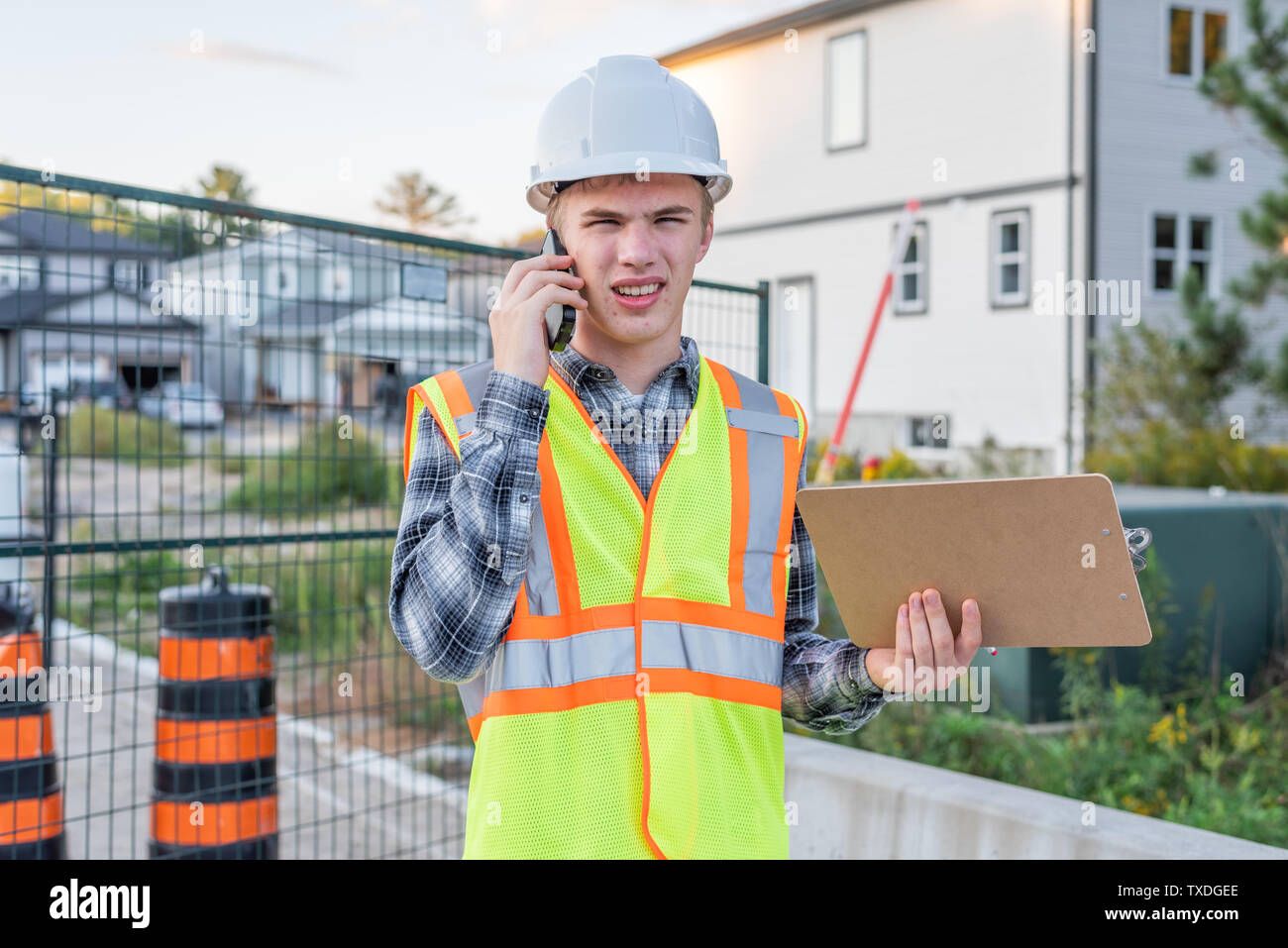 Angry construction worker talking on hi-res stock photography and ...