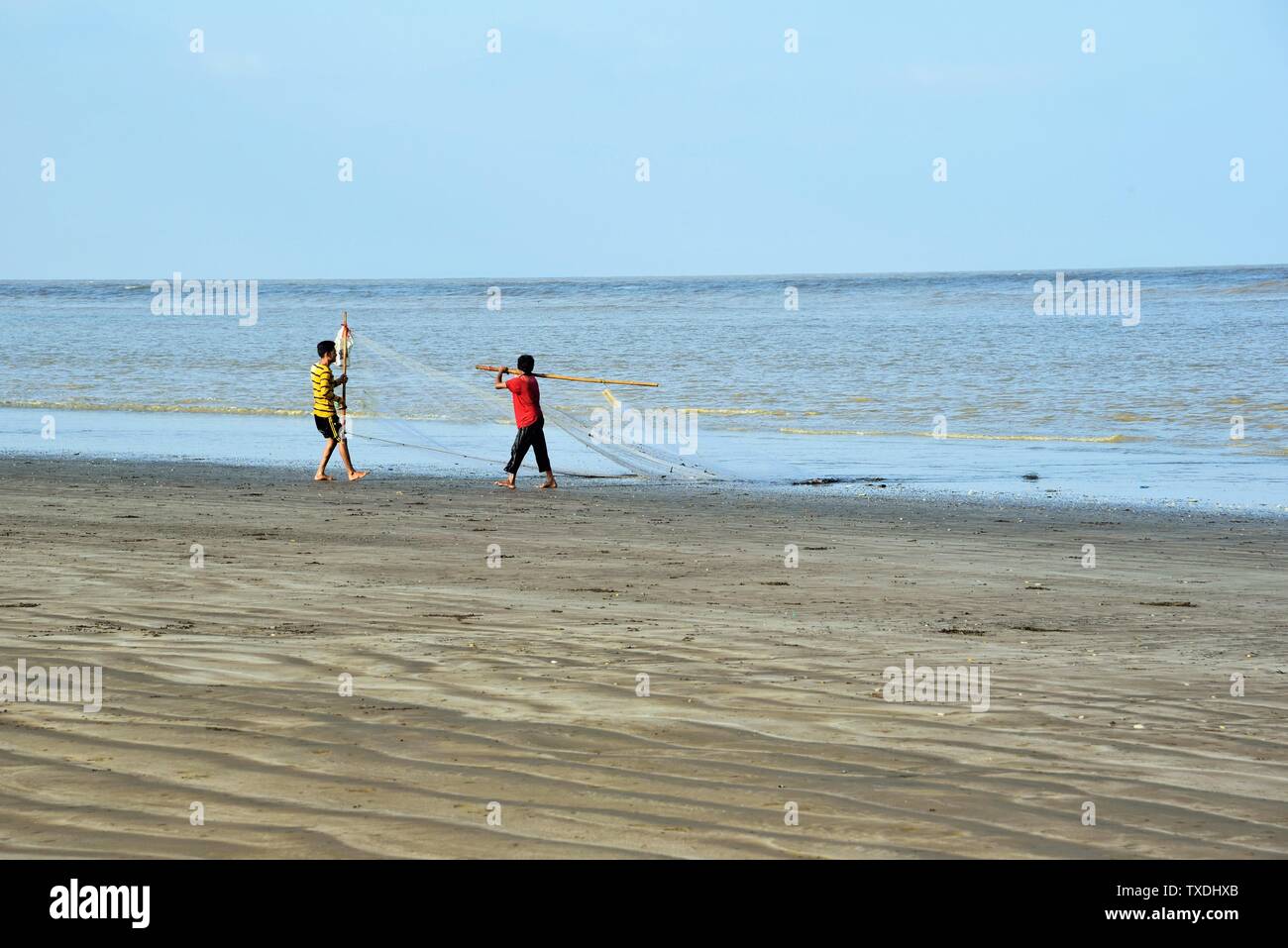 Fishermen fishing, Kosamba Beach, Valsad, Gujarat, India, Asia Stock ...