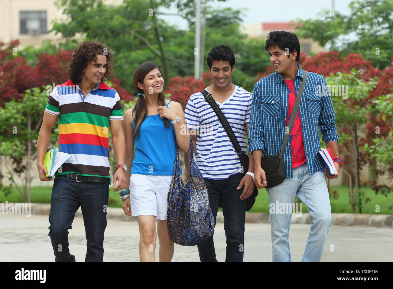 College students walking at the campus Stock Photo - Alamy