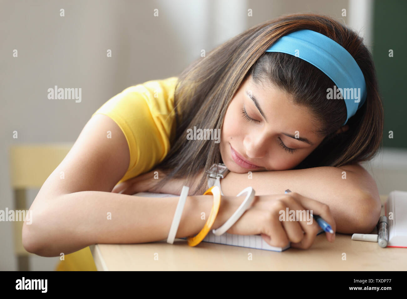 College girl dozing in classroom Stock Photo - Alamy
