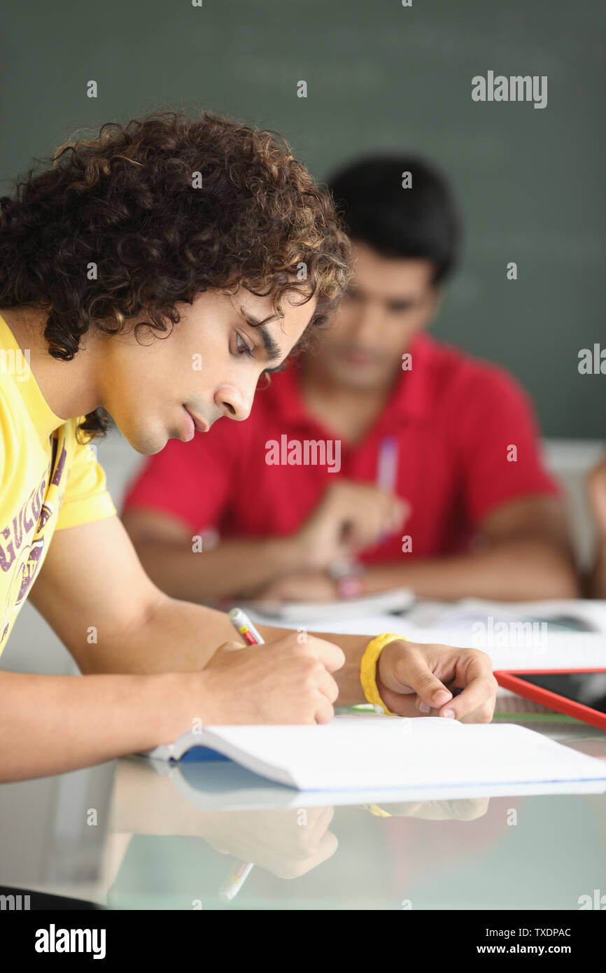 College students studying in a classroom Stock Photo - Alamy