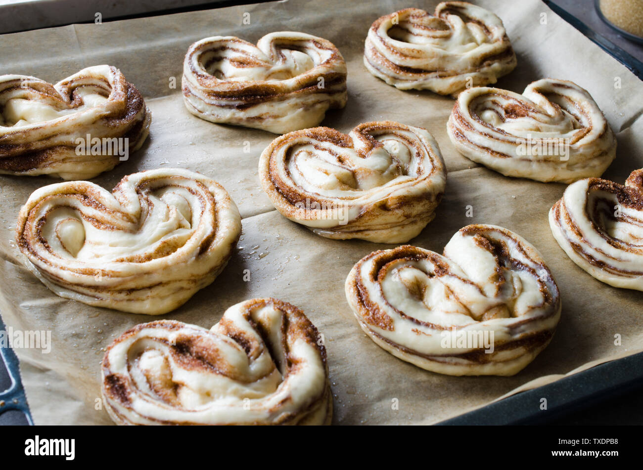 Raw unbaked buns. Ready to bake homemade traditional cinnamon buns on ...