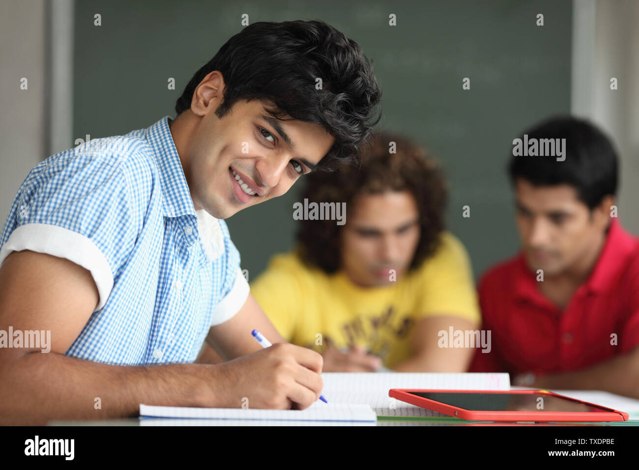 College students studying in a classroom Stock Photo - Alamy