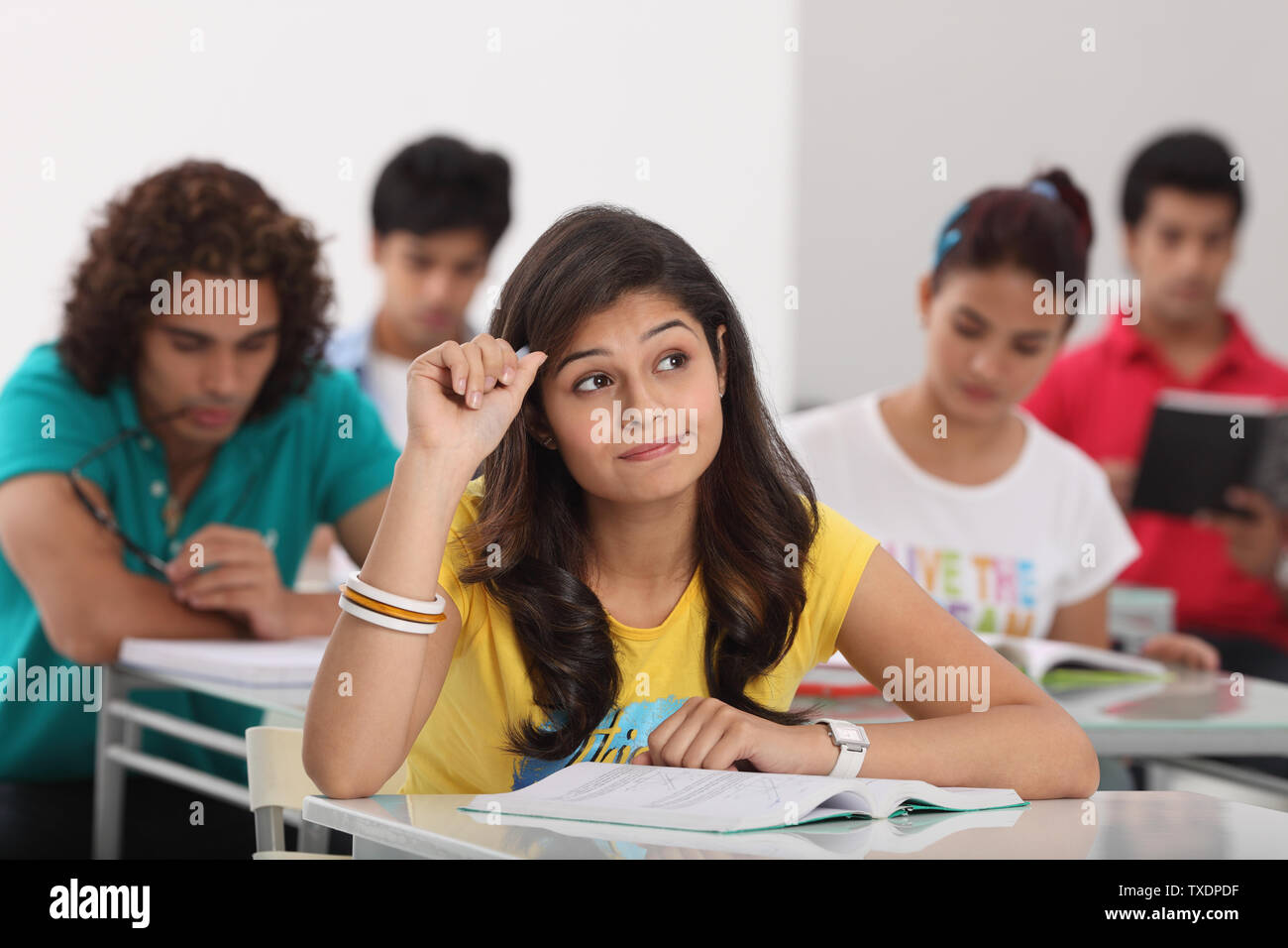 College students studying in a classroom Stock Photo - Alamy
