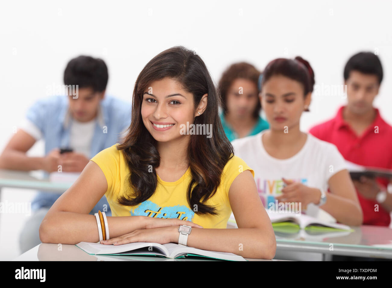 College students studying in a classroom Stock Photo - Alamy