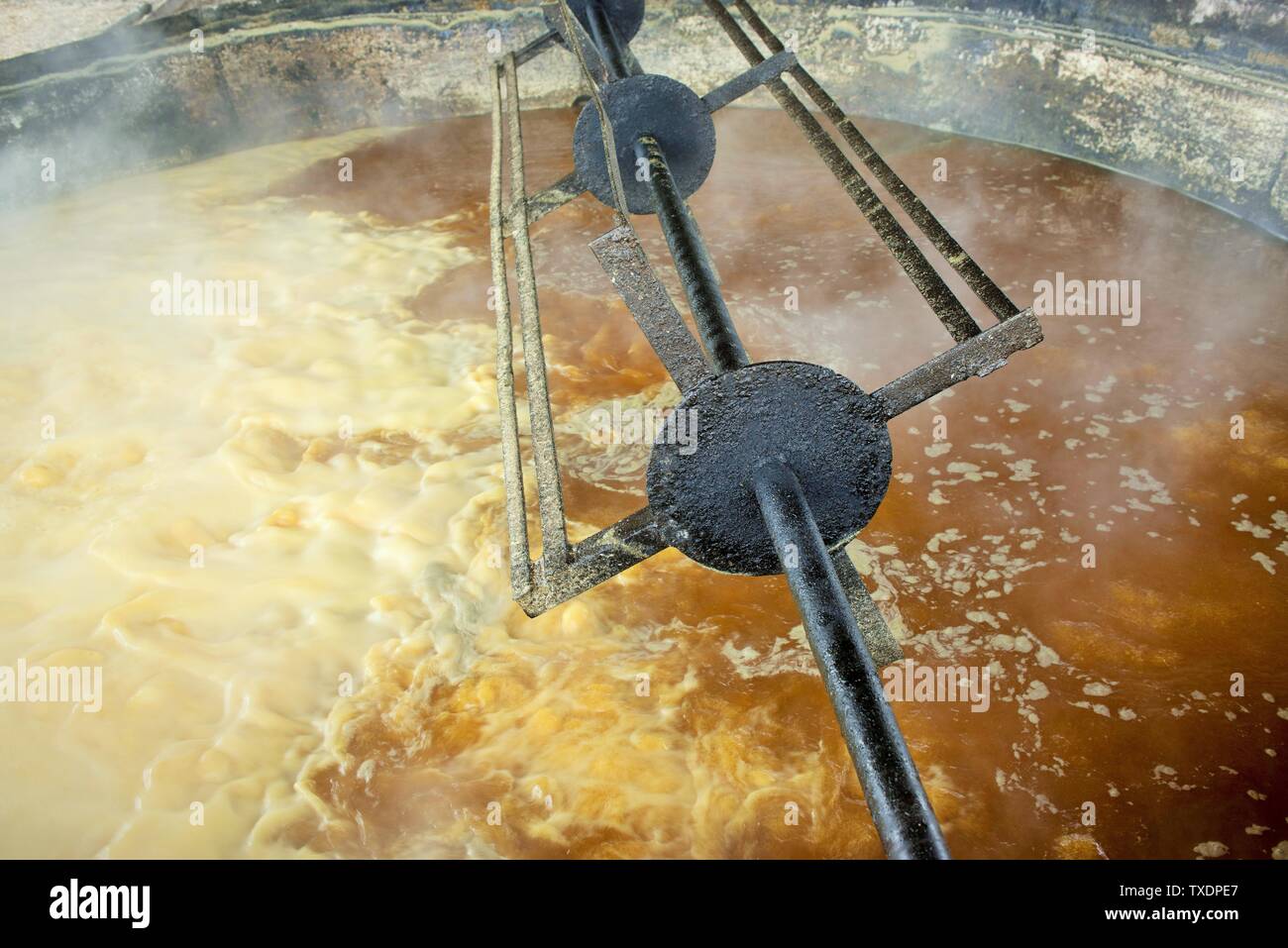 Boiling the sugar cane juice hi-res stock photography and images - Alamy