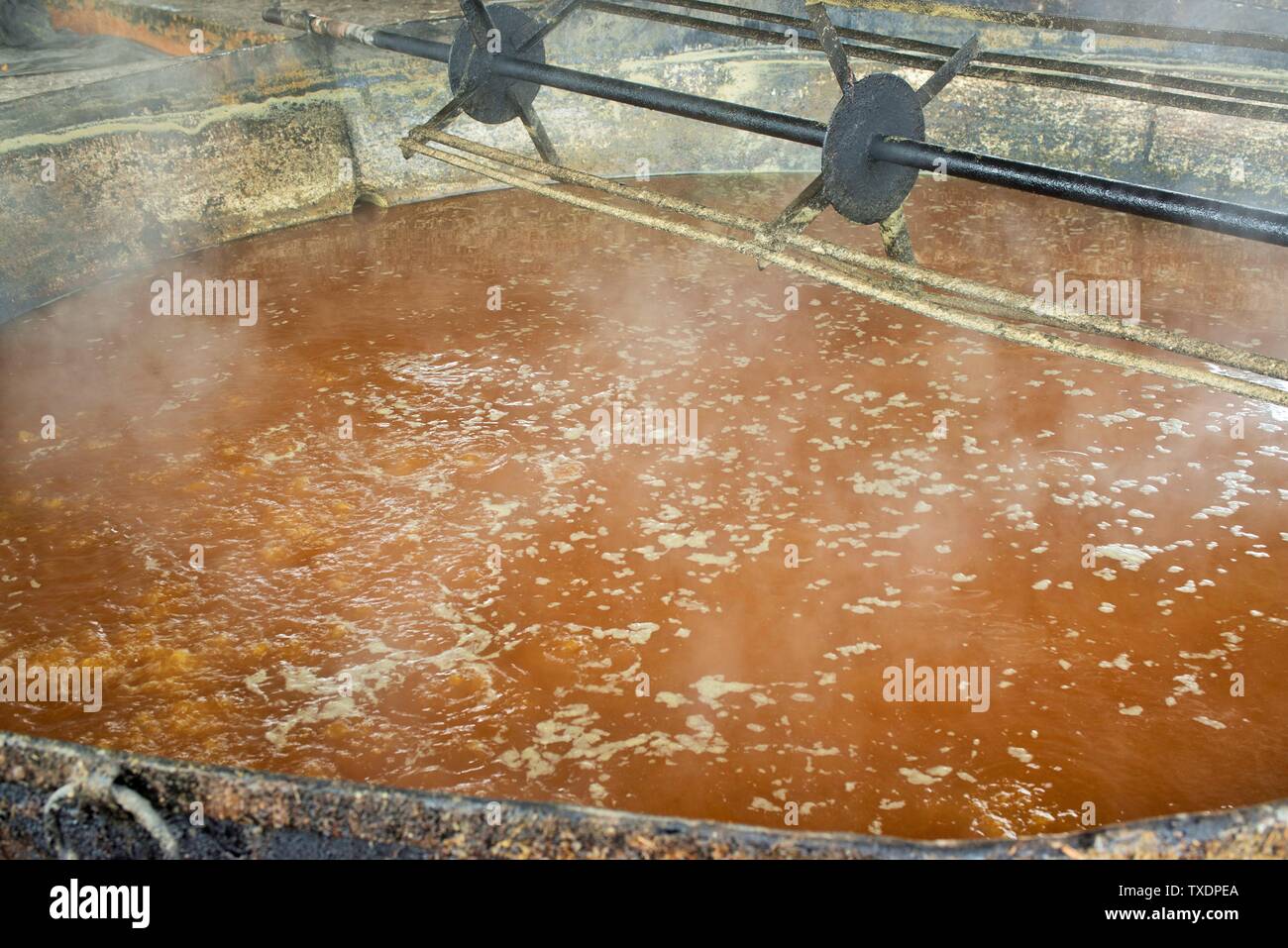 Boiling the sugar cane juice hi-res stock photography and images - Alamy