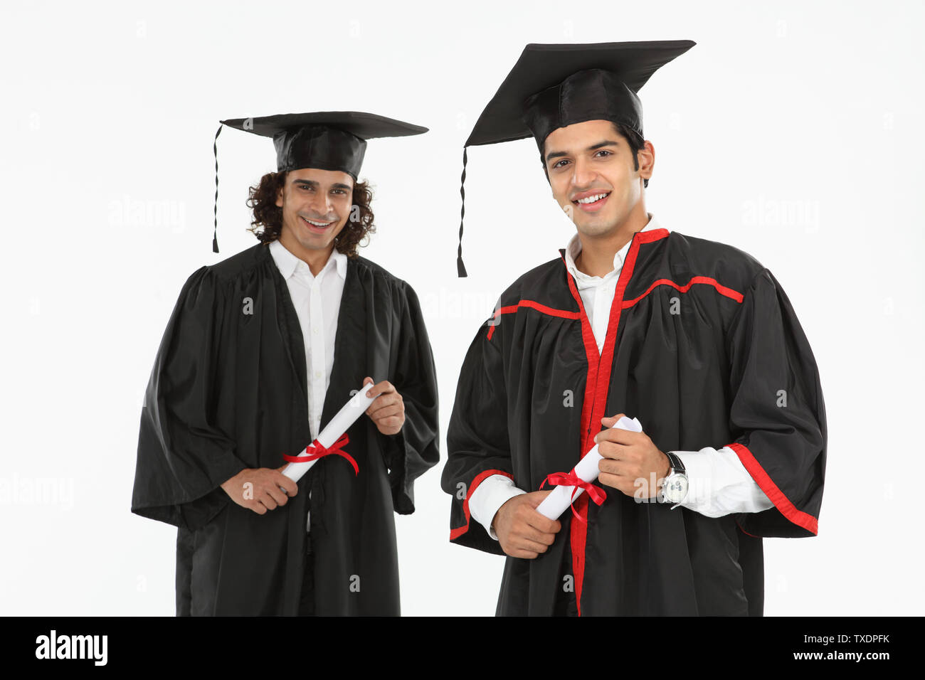 University students holding their graduation diplomas Stock Photo - Alamy