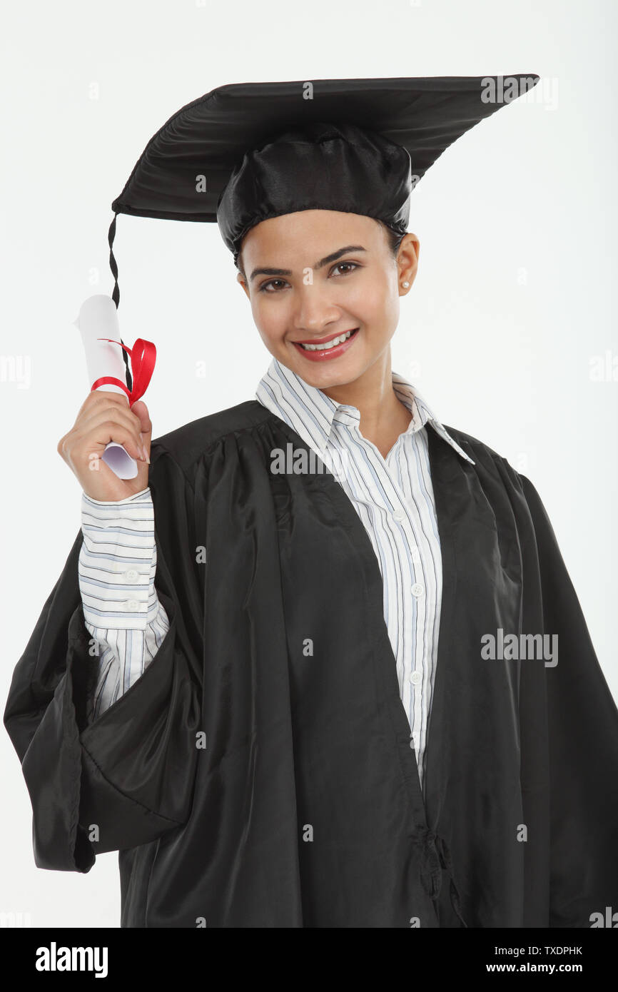 University student holding graduation degree Stock Photo - Alamy