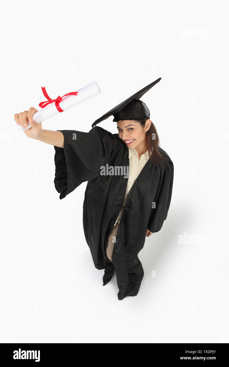 University student holding graduation degree Stock Photo - Alamy