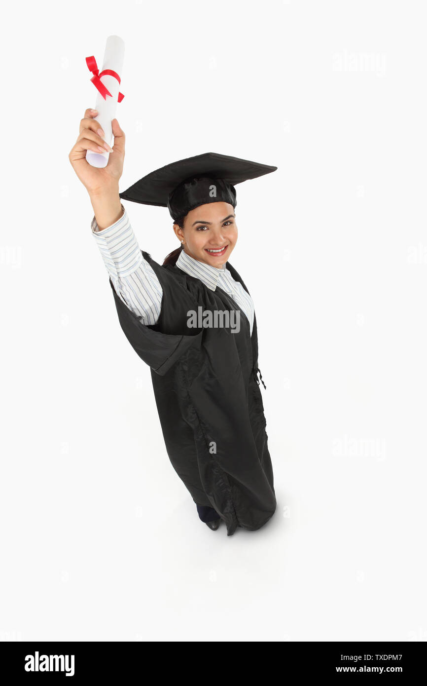 University student holding graduation degree Stock Photo - Alamy