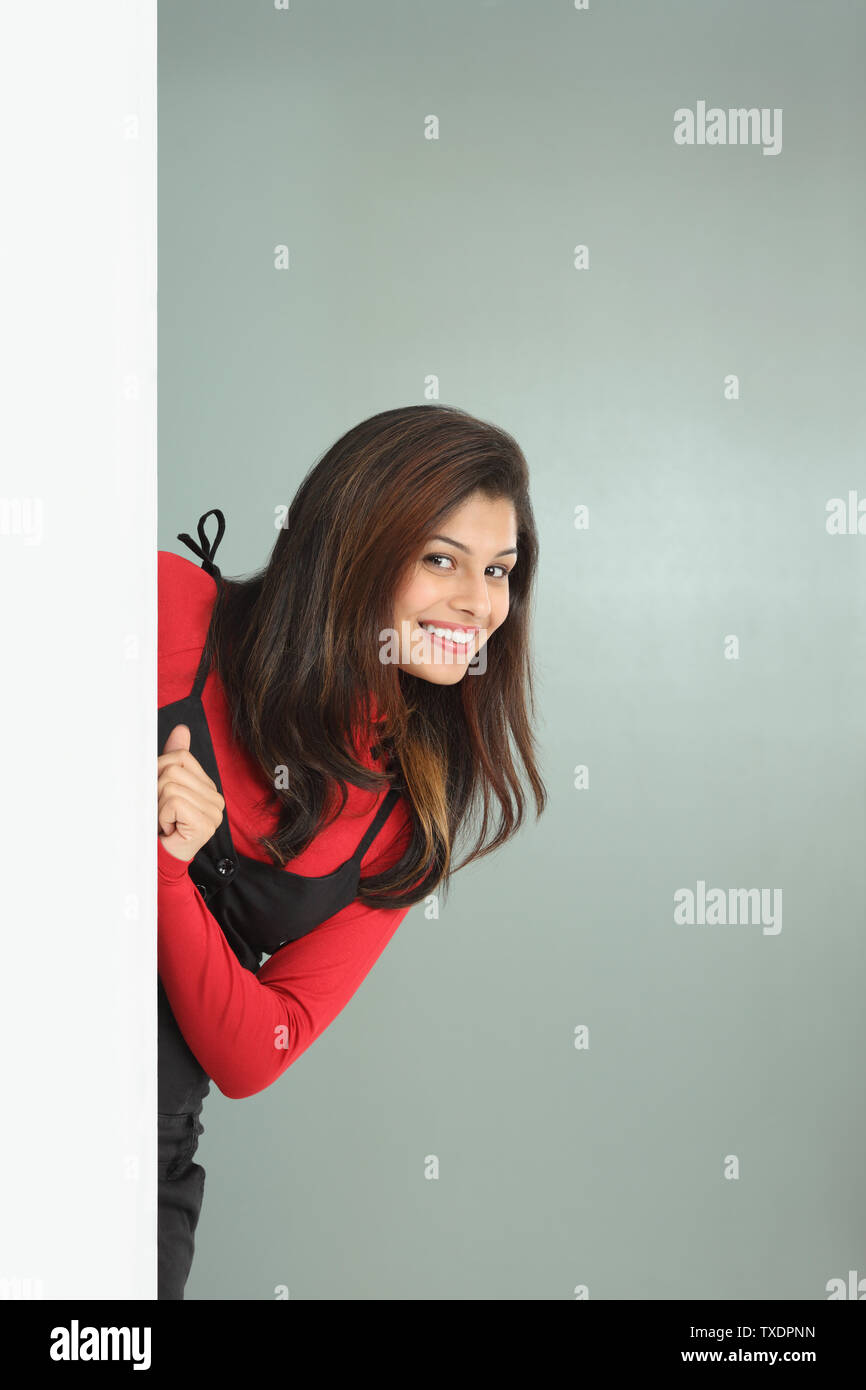 Portrait indian girl hiding behind hi-res stock photography and images ...