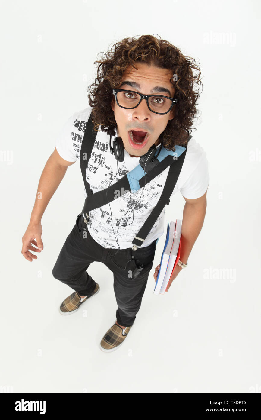 Portrait of a college student looking shocked Stock Photo - Alamy