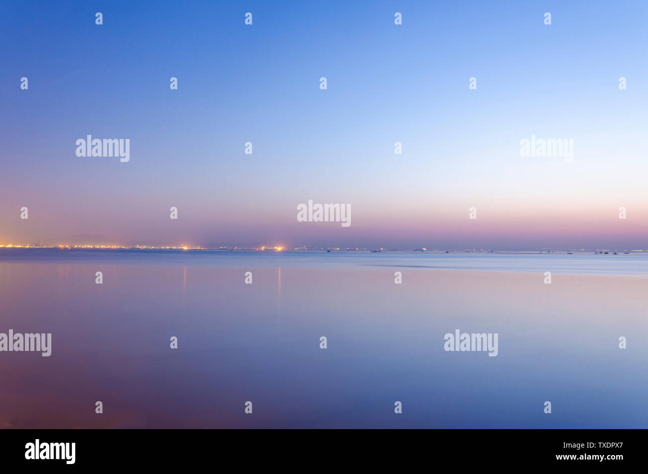 The calm sea at night Stock Photo - Alamy