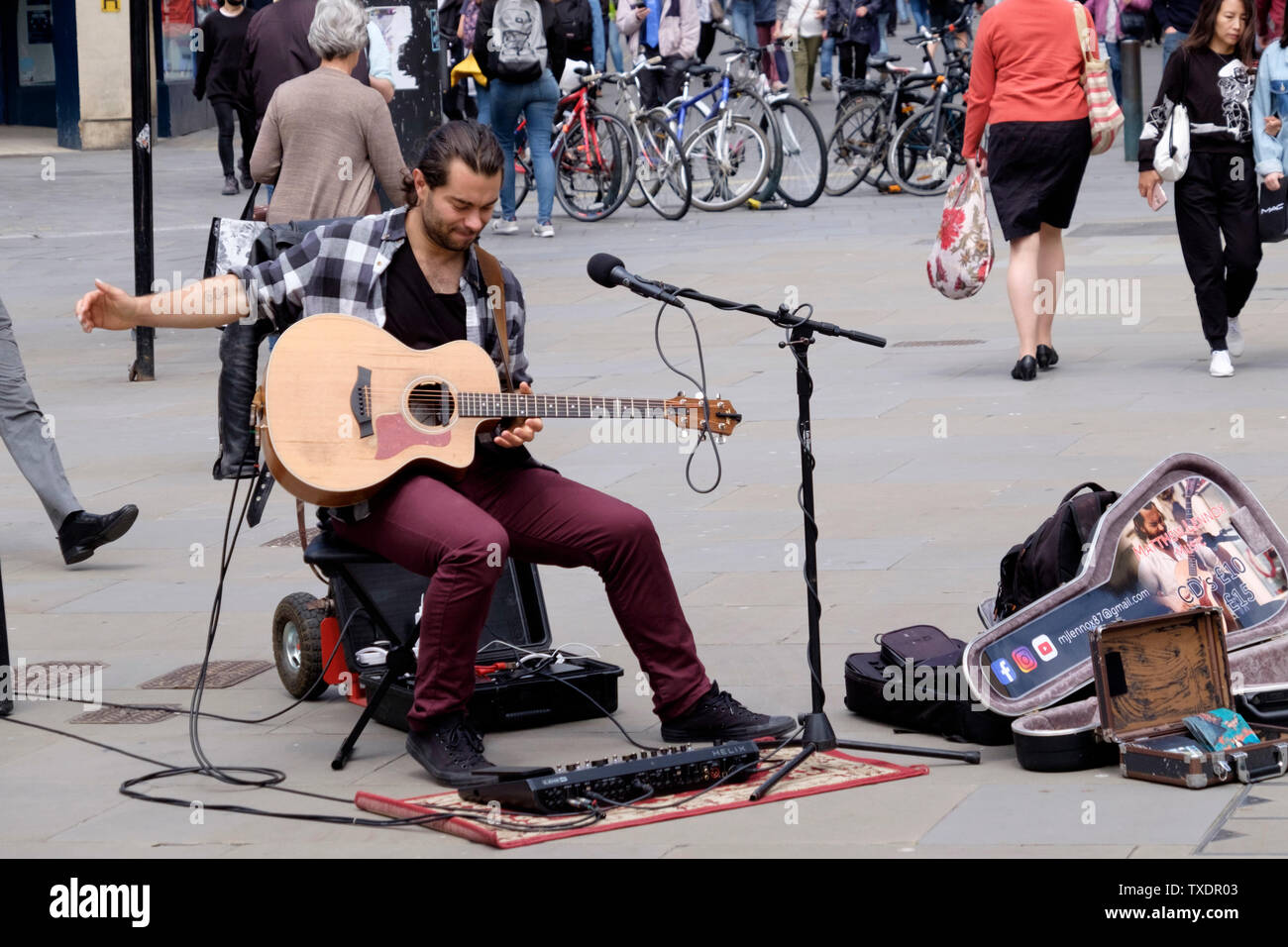 Bath has many street entertainers and musicians this is Matthew Lennox ...