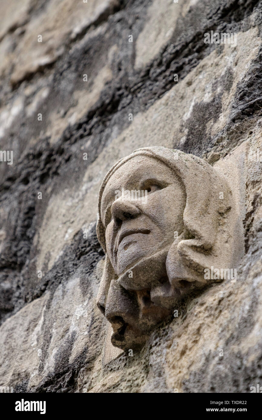 Grotesque head sculptures on the wall Walcot Street Bath somerset UK ...