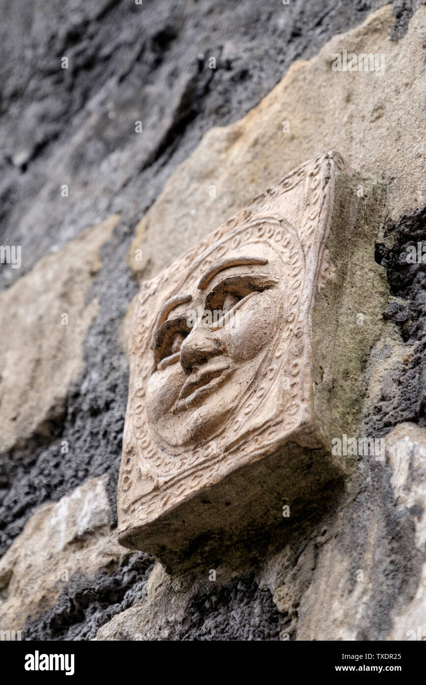 Grotesque head sculptures on the wall Walcot Street Bath somerset UK ...