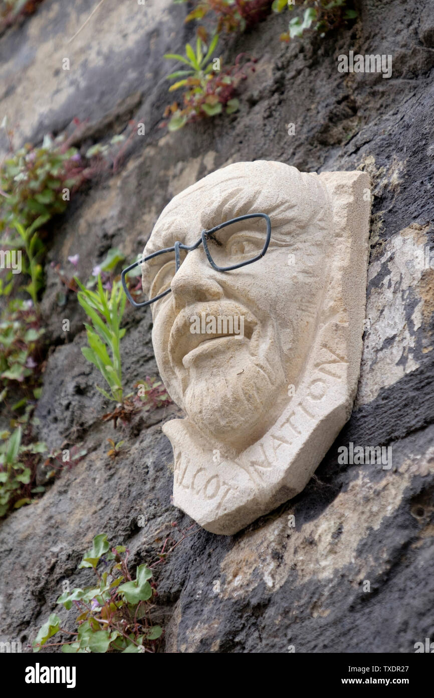 Grotesque head sculptures on the wall Walcot Street Bath somerset UK ...