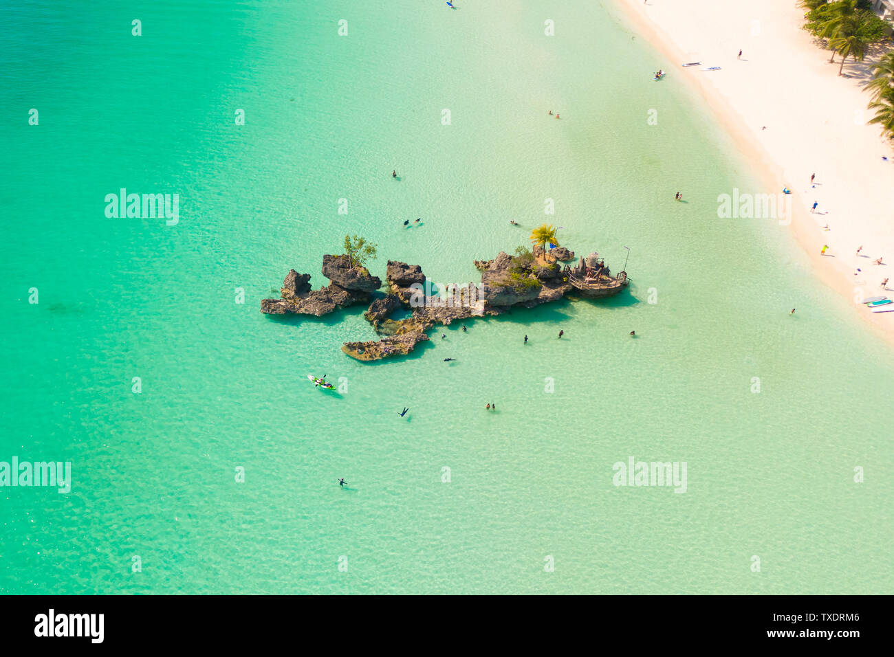 White sand beach and lagoon with turquoise water, aerial view. Coast of ...