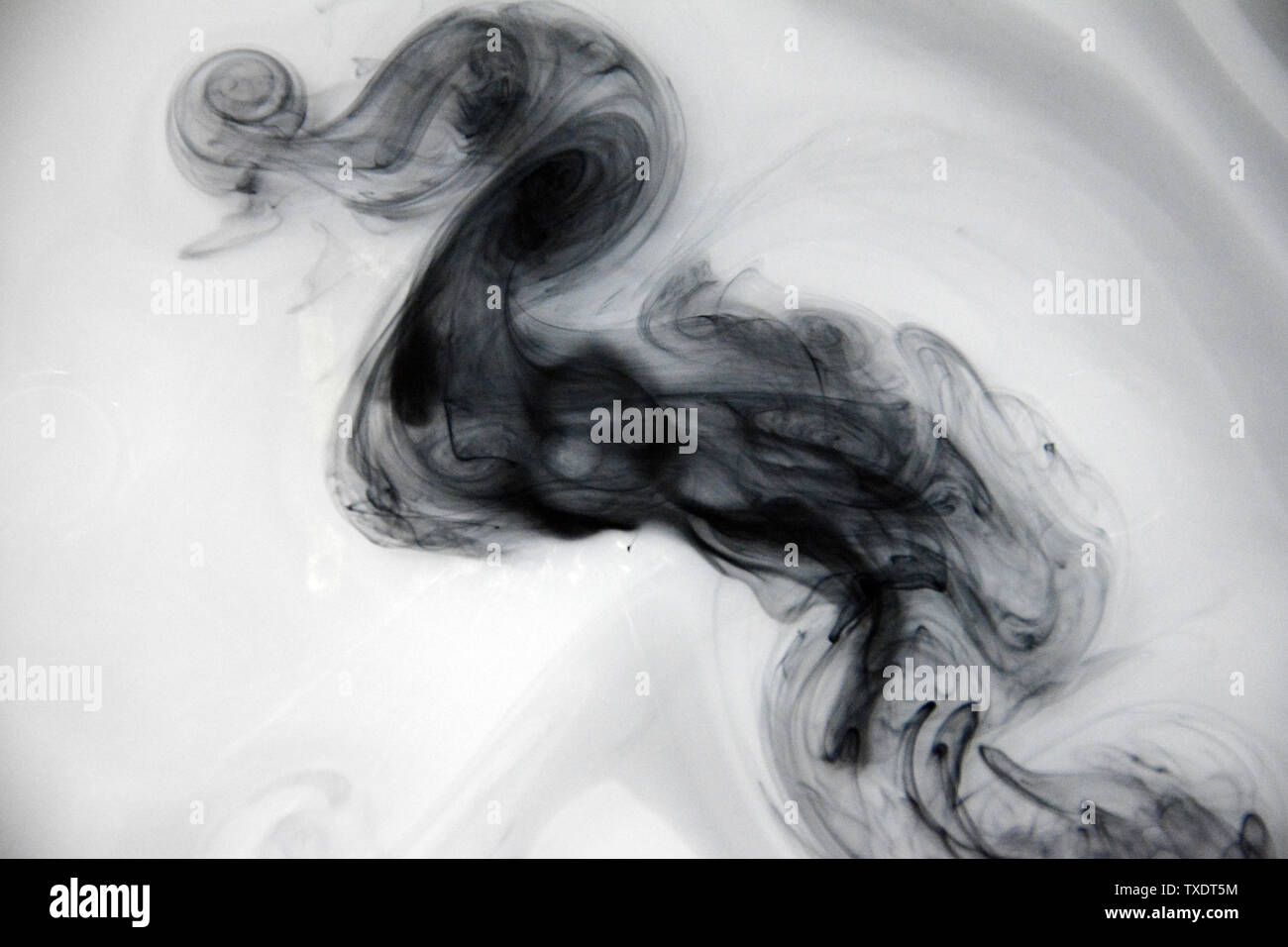 Ink background, ink flowing in water Stock Photo - Alamy