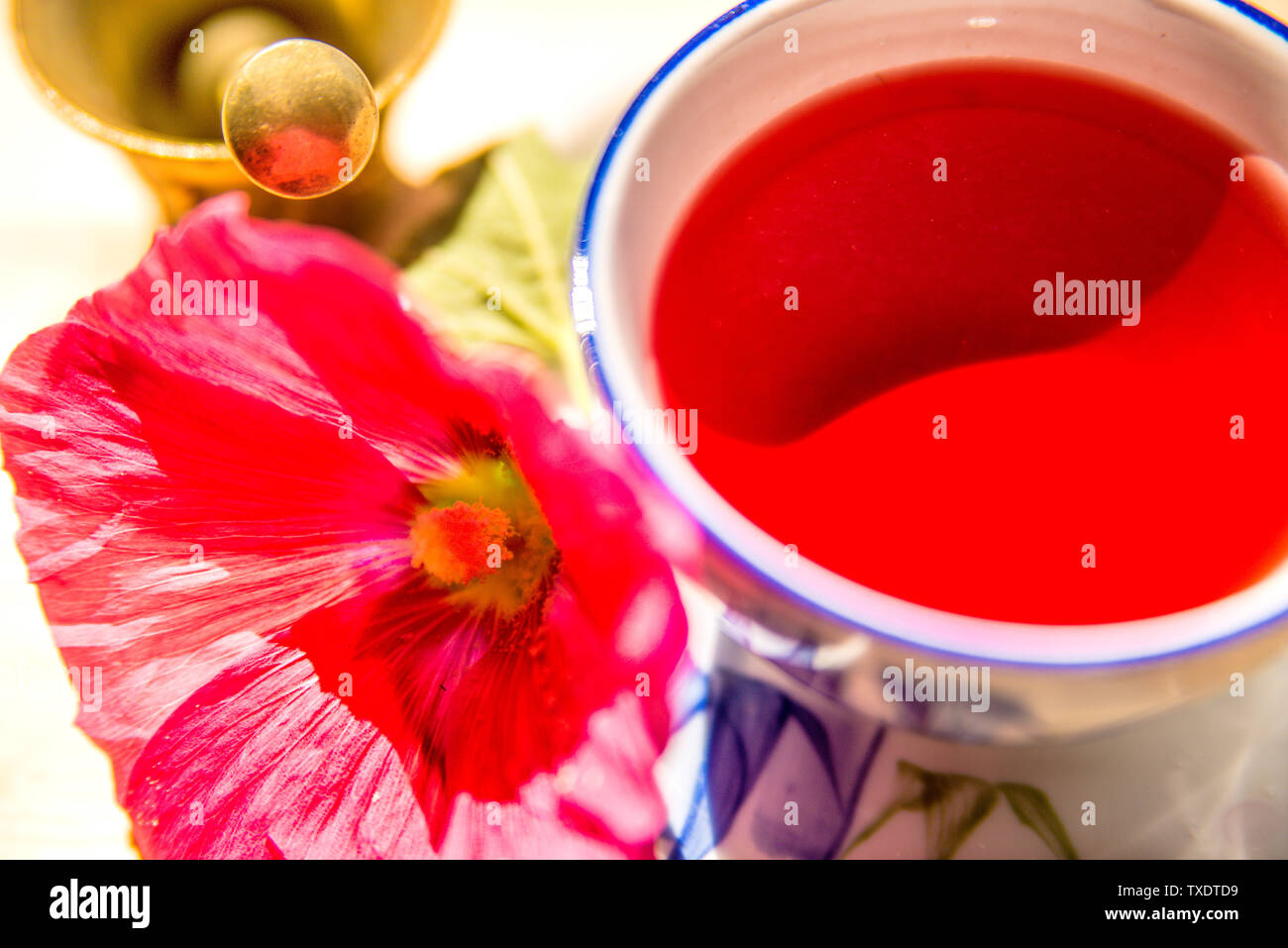 mallow tea, cup with mallow flower and mortar Stock Photo - Alamy
