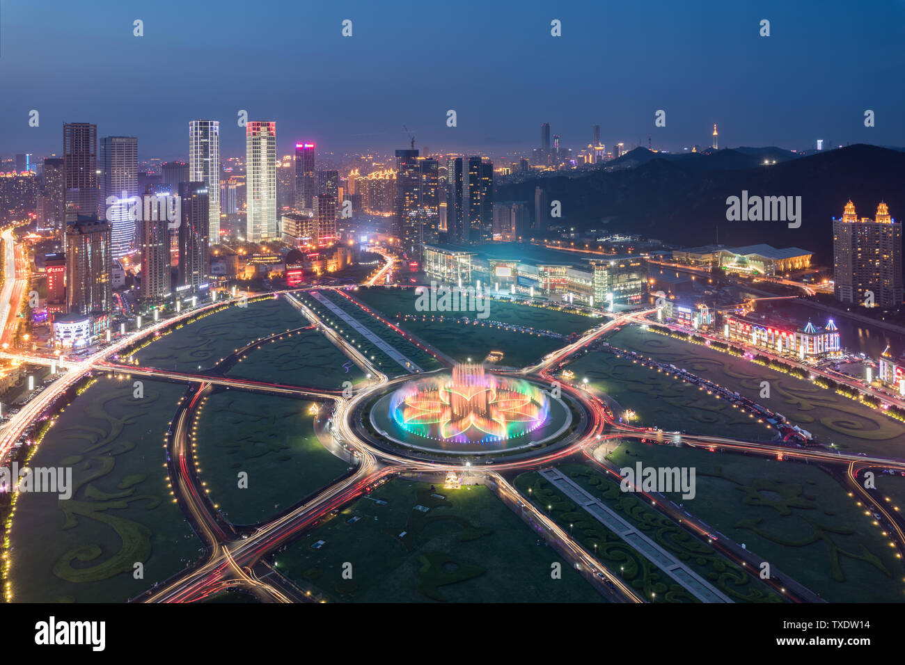 Night view of Xinghai Plaza in Dalian Stock Photo - Alamy