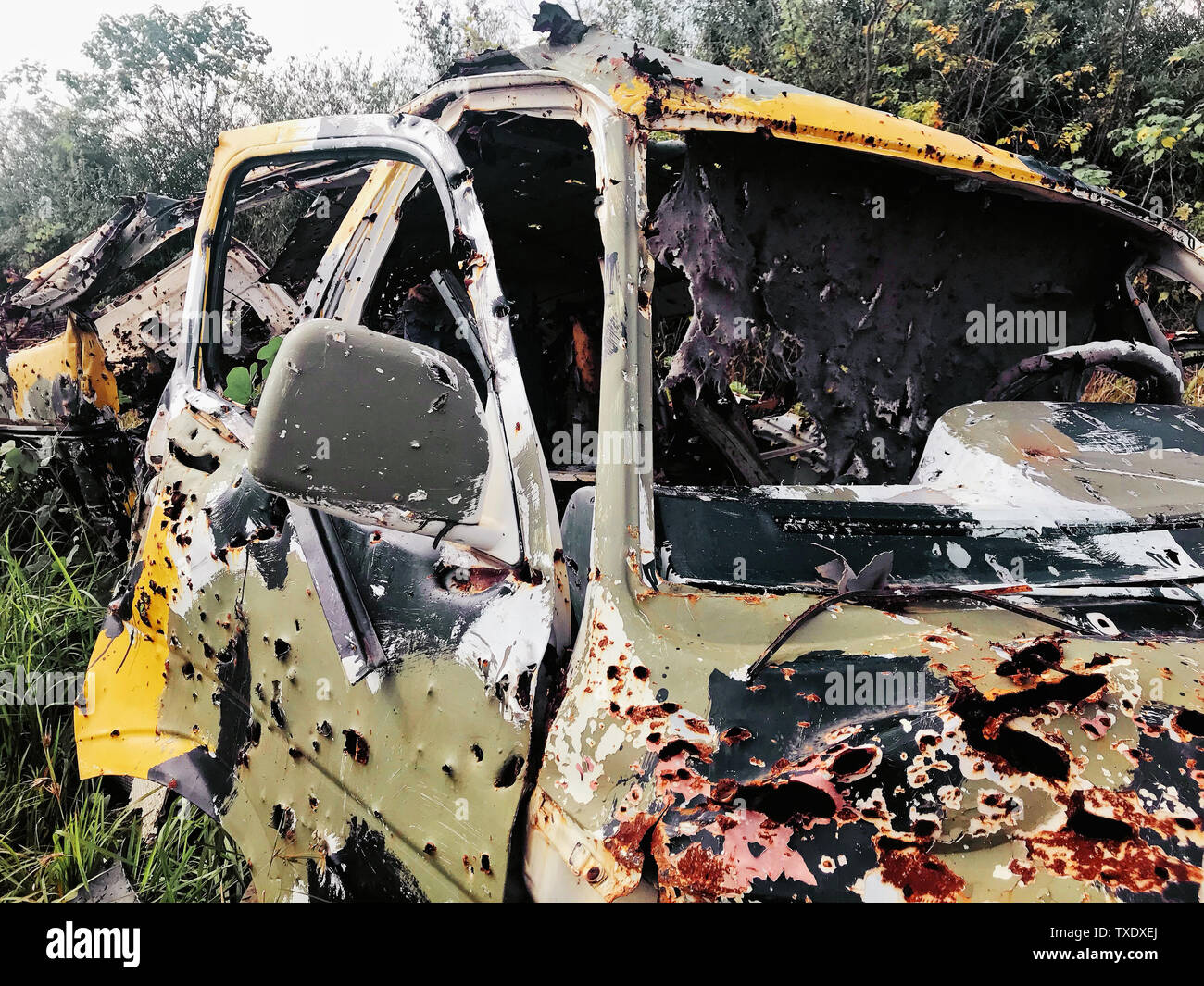 An armored vehicle that was shot through Stock Photo - Alamy