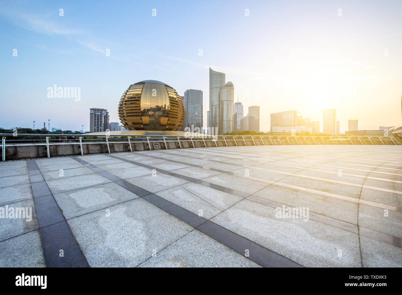 modern square and skyscrapers under sunbeam Stock Photo - Alamy