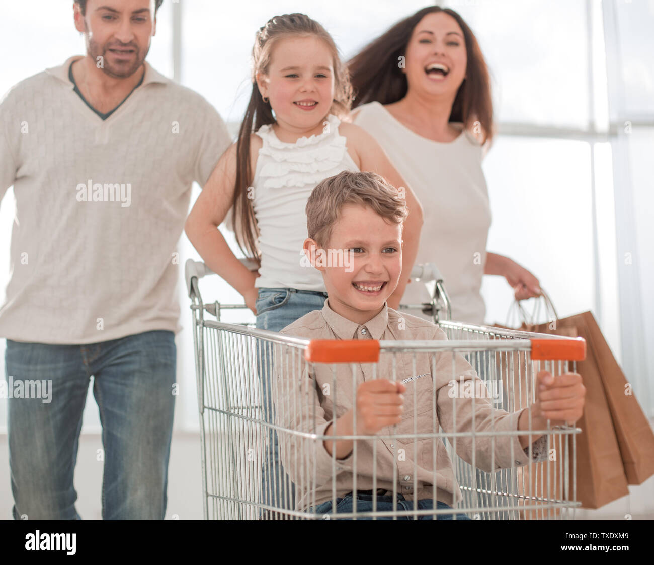 happy family with cart and kids Stock Photo - Alamy