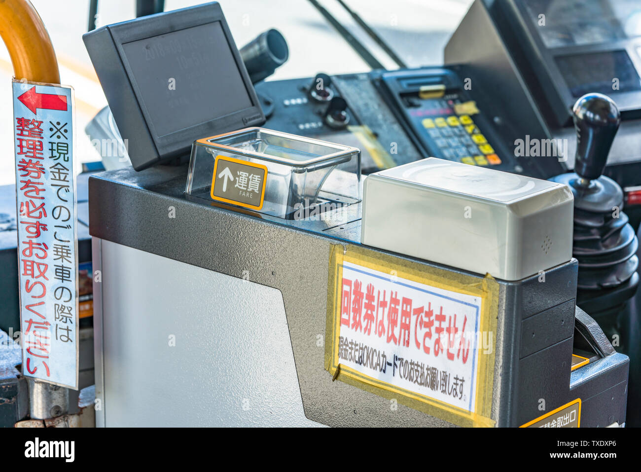 Ticket machine and payment machine next to the bus driver's seat of ...