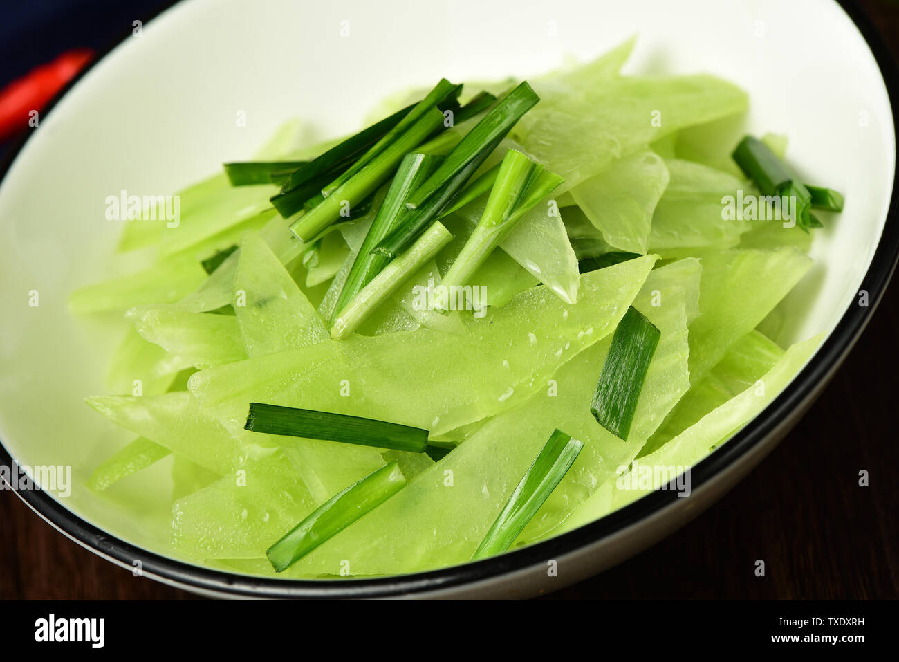 Leek stir-fried lettuce Stock Photo - Alamy