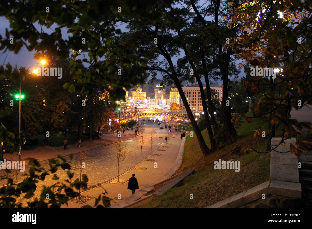 Night street with burning lanterns. Kyiv street at night. Lights of ...
